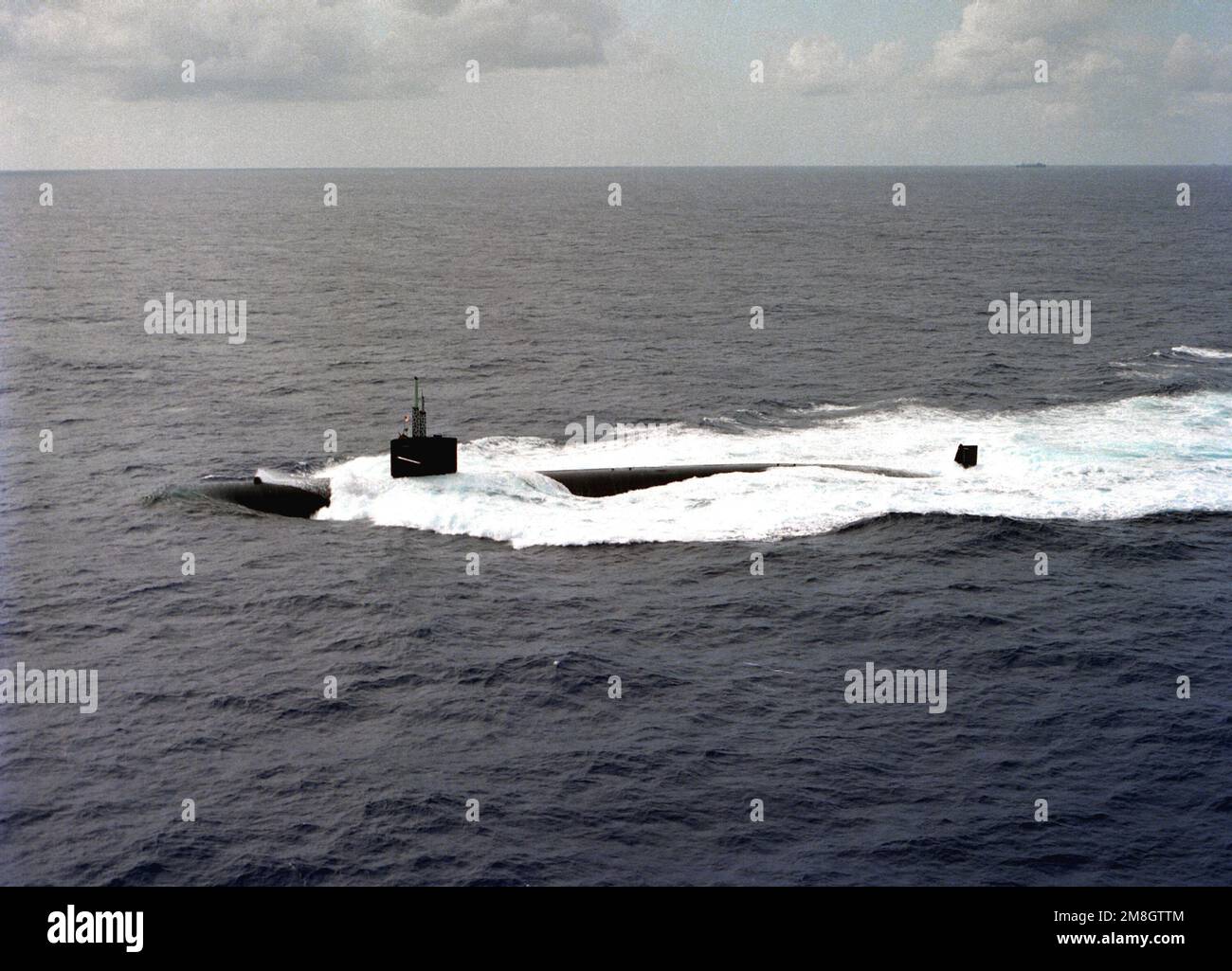 A port view of the nuclear-powered attack submarine USS ALBUQUERQUE ...