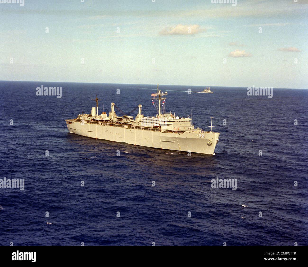 A starboard bow view of the destroyer tender USS PUGET SOUND (AD-38 ...