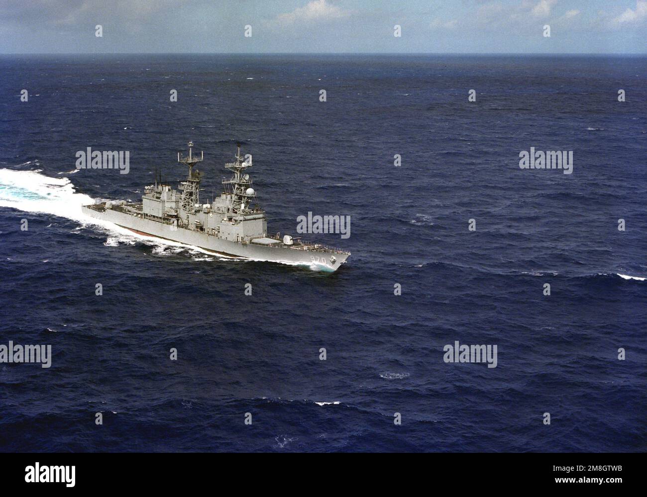 A starboard bow view of the destroyer CARON (DD-970) underway. The ...