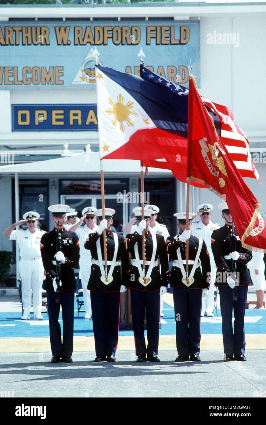 A Marine color guard presents the Philippine American and Marine Corps ...