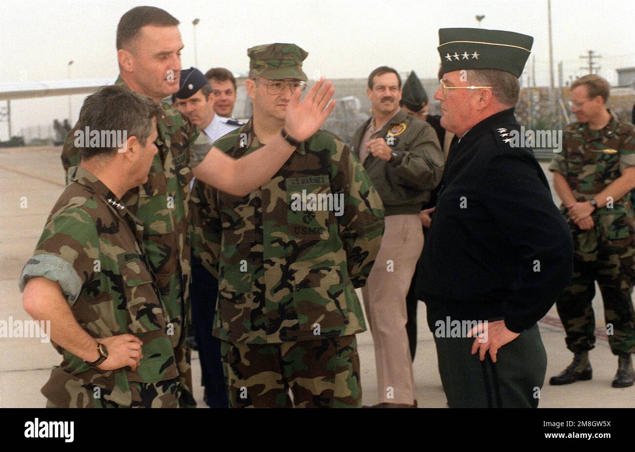 A Marine officer gestures to GEN. John M. Shalikashvili, Supreme Allied ...