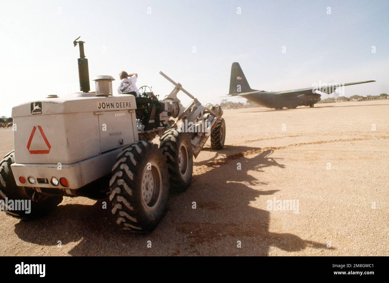 In support of Operation Provide Relief, 823rd Redhorse Squadron works ...