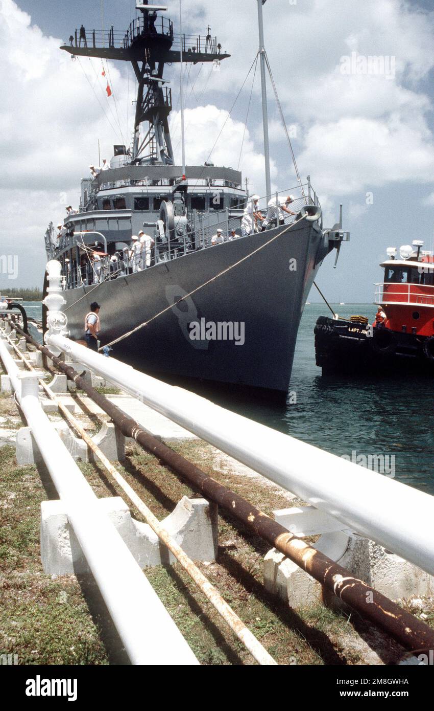 Lieutenant Paul Beckwith, left, and ENSIGN Frank Espinosa check their ...