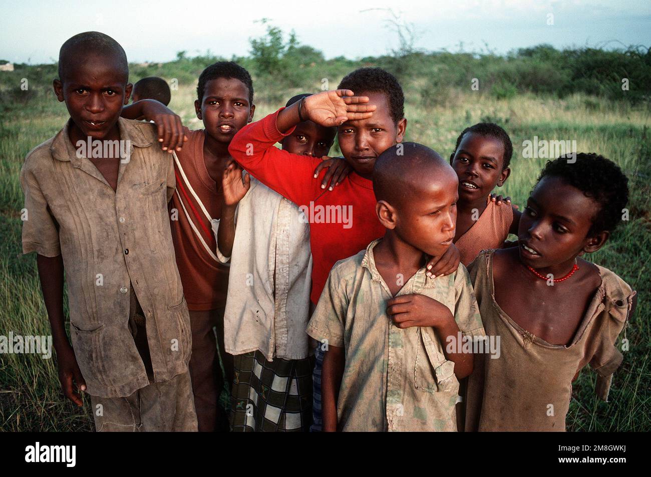 Somali children gather at a food distribution site during Operation ...