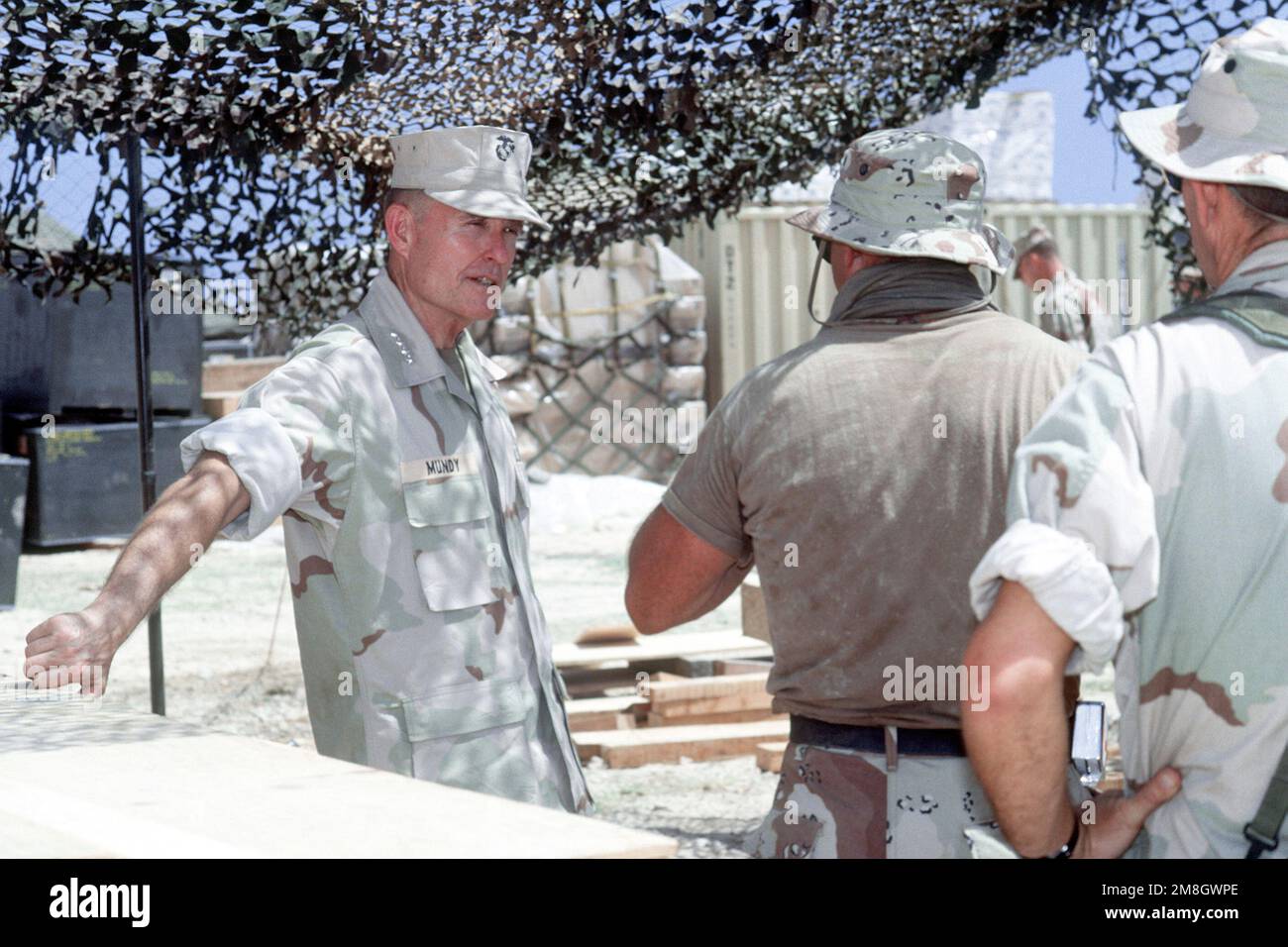 GEN Carl E. Mundy Jr., commandant of the Marine Corps, talks with ...