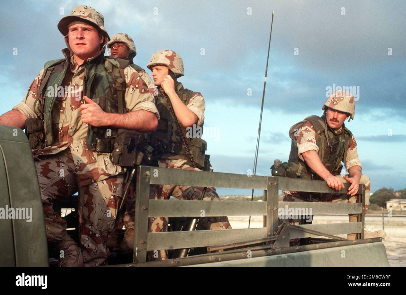 Members of Naval Mobile Construction Battalion 40 (NMCB-40) stand in ... Members of Naval Mobile Construction Battalion 40 (NMCB-40) stand in ...