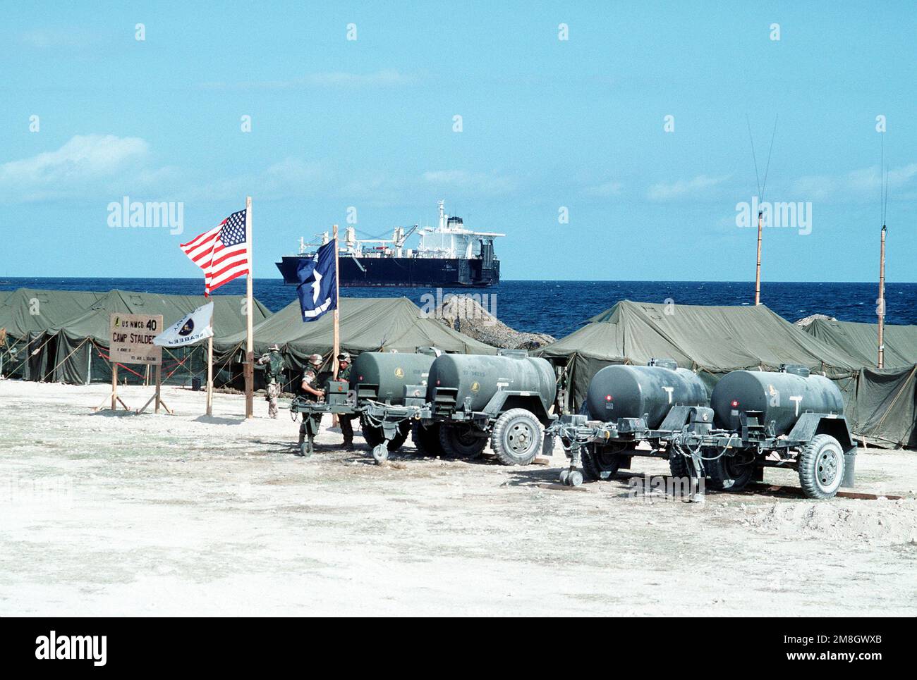 A stiff ocean breeze keeps the colors flying at Camp Stalder ...