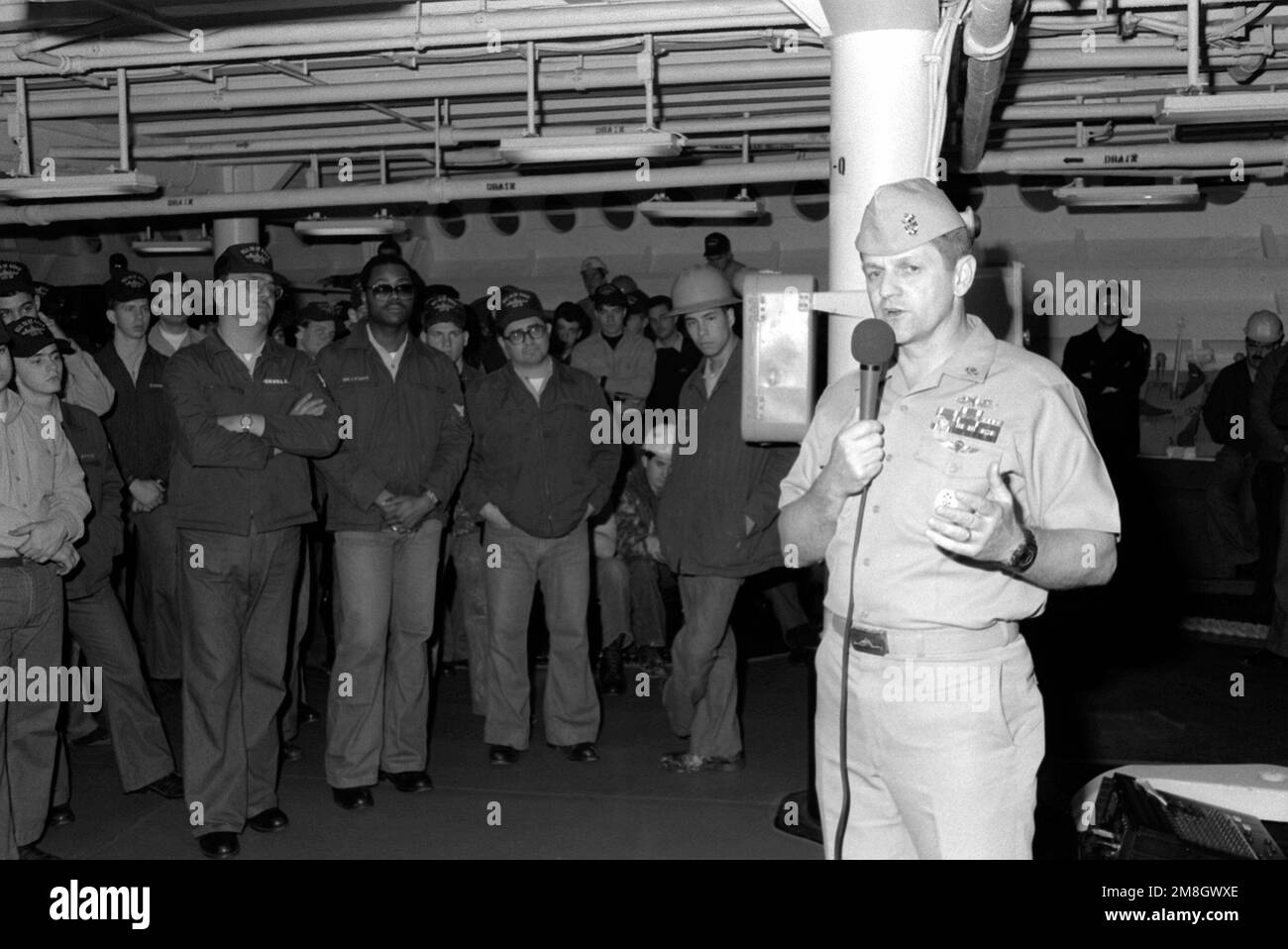 MASTER CHIEF PETTY Officer of the Navy John Hagan speaks to crew ...
