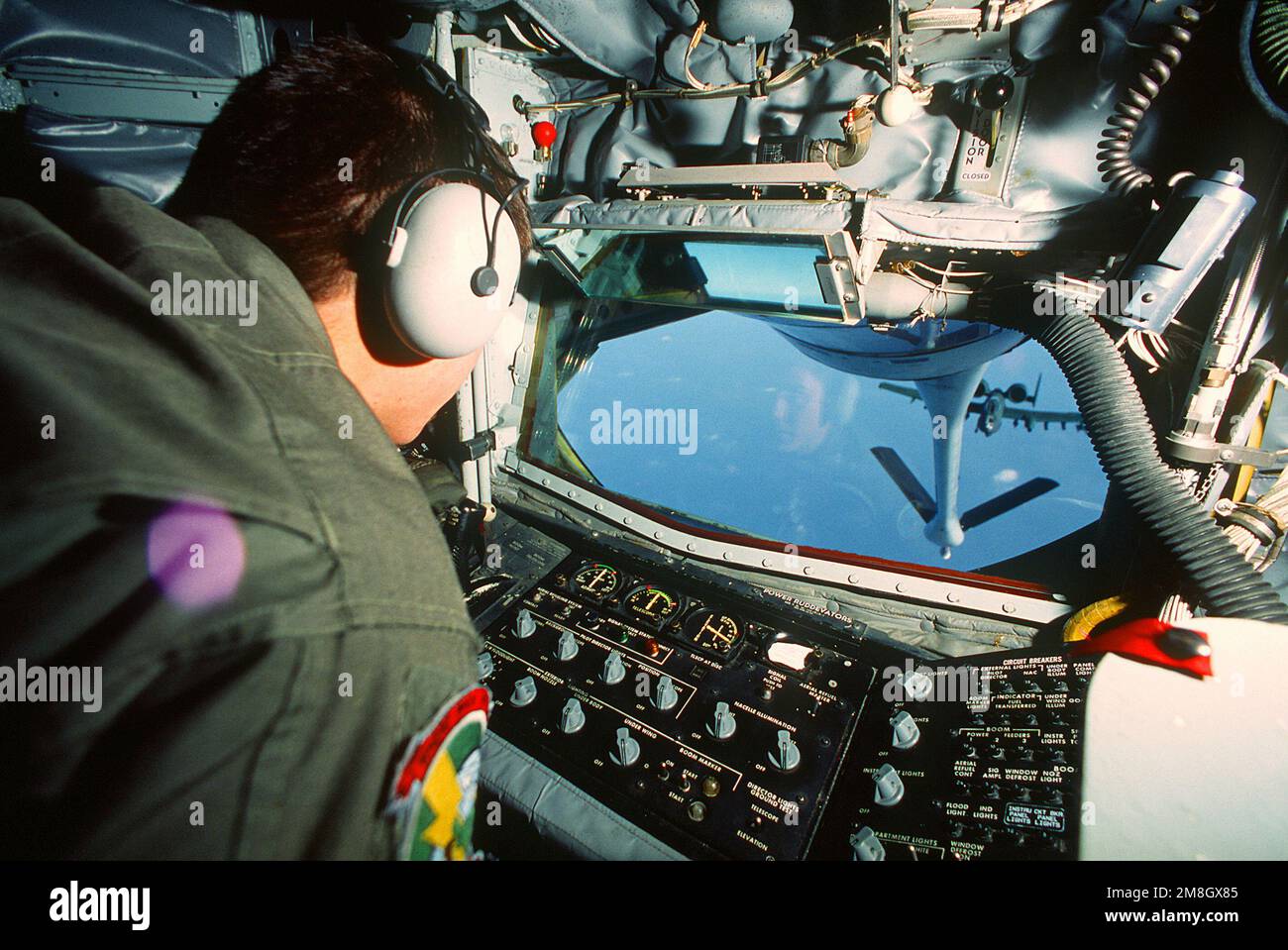 SENIOR AIRMAN Clayton Izumi, a refueling boom operator aboard a 310th ...