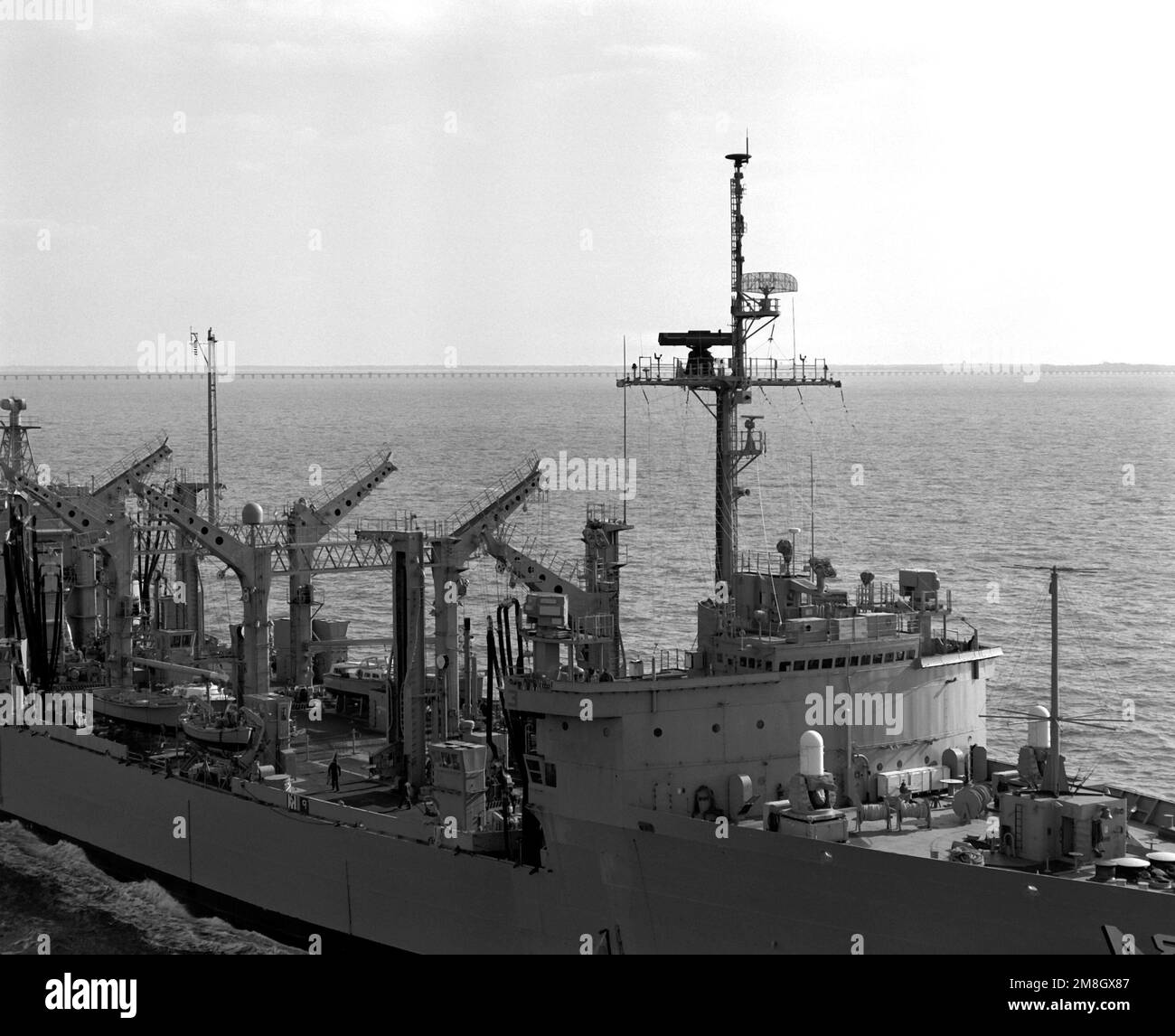 A port view of the forward section of the replenishment oiler USS ...