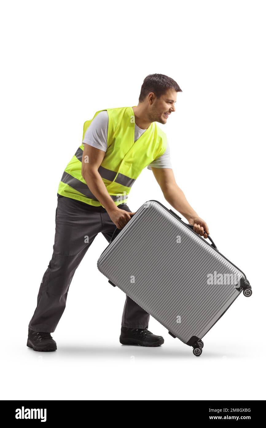Airport worker pushing a suitcase isolated on white background Stock ...