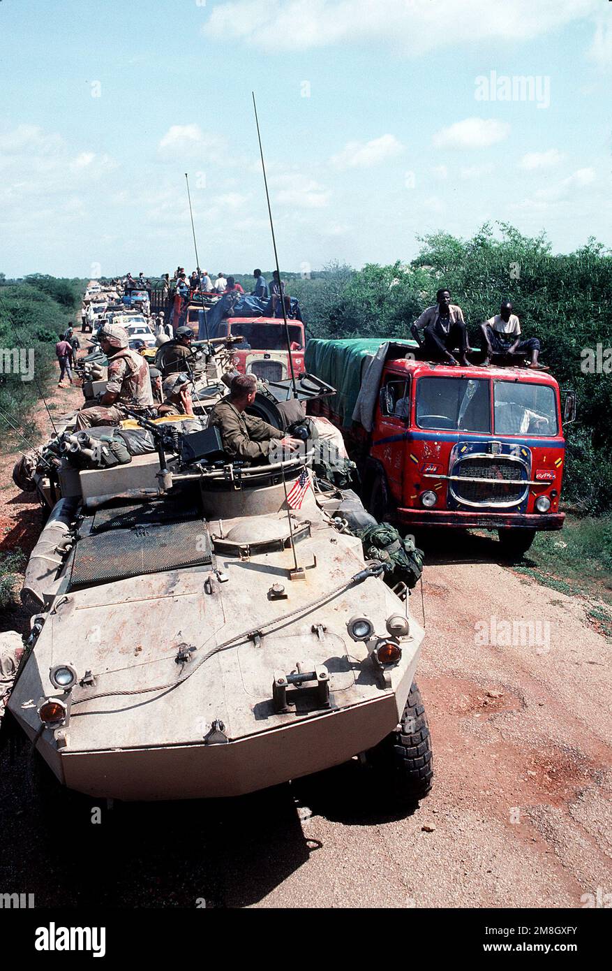 Marines from the 15th Marine Expeditionary Unit (MEU) man an LAV(C ...