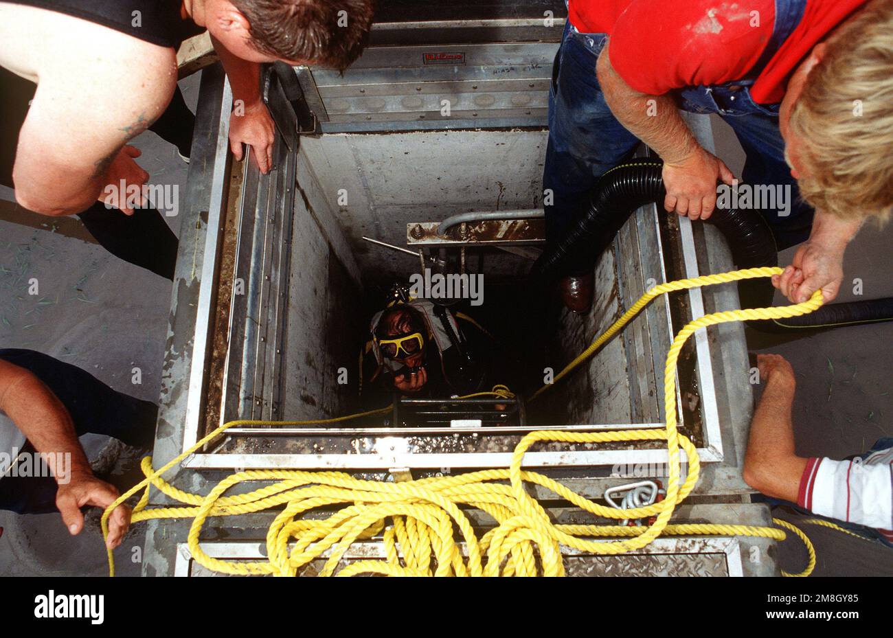 Bill Herington from Tunla (in scuba gear) and Rollie Robins of Colfax ...
