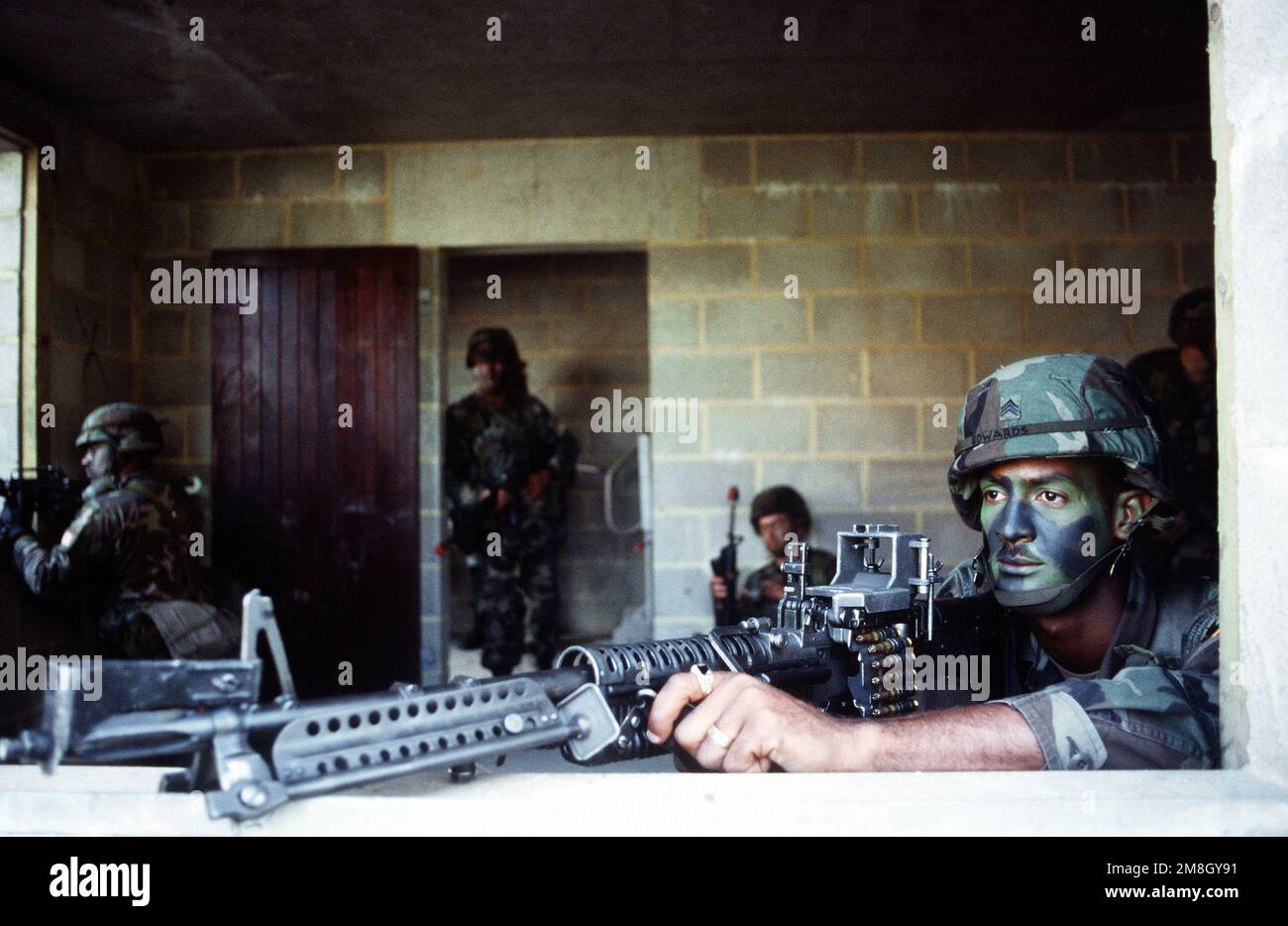 U.S. Army Soldiers armed with M60 machine guns watch for movement after ...