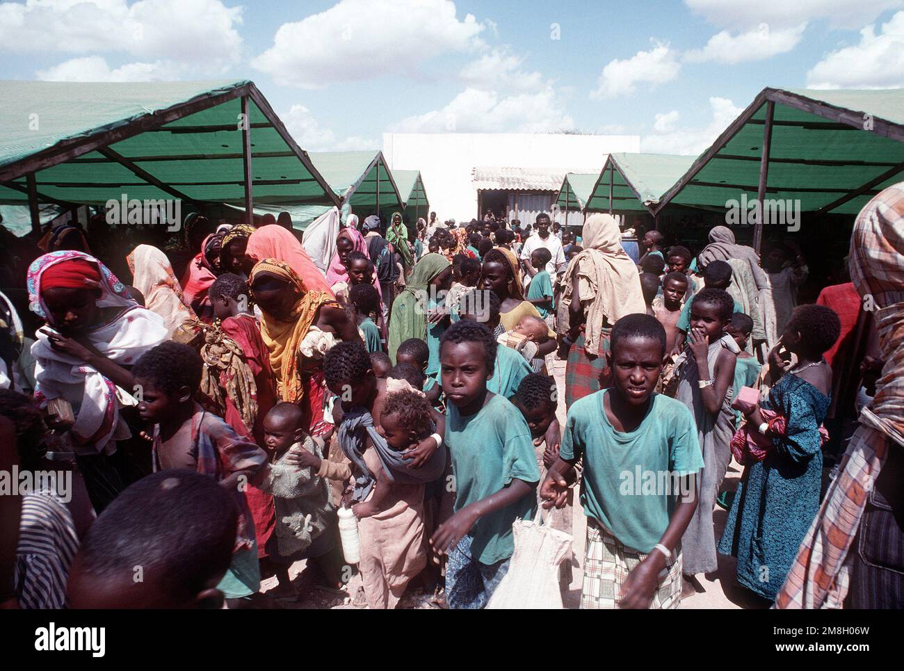 Somalis gather at the Concern Feeding Center during the multinational ...