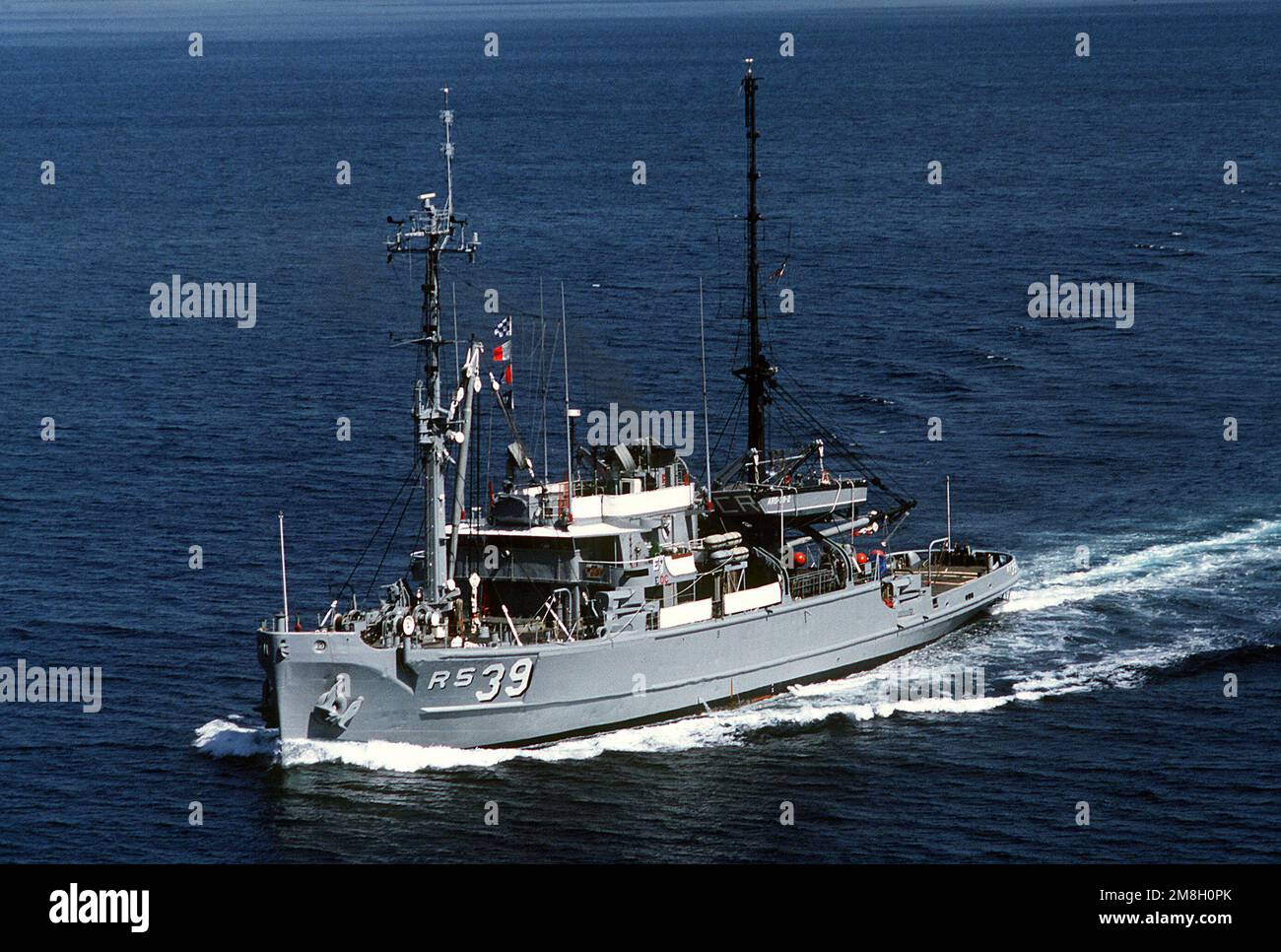 A port bow view of the salvage ships USS CONSERVER (ARS-39) underway ...