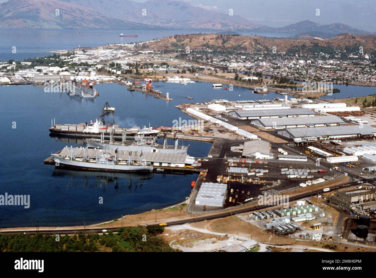 A view of three ships moored at the depot. The ships are, from top to ...