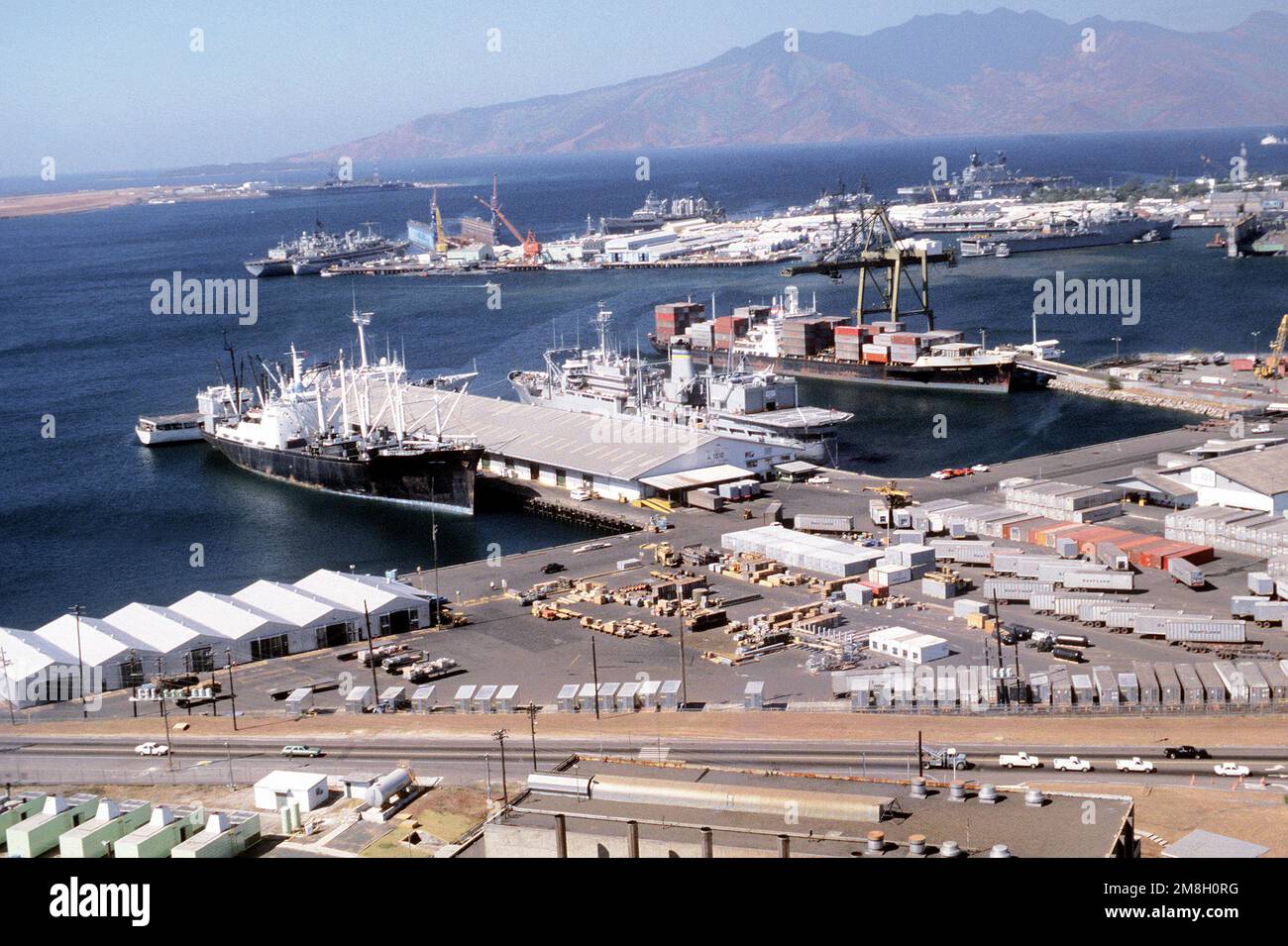 A view of four ships moored at the depot. They are, from left to right ...