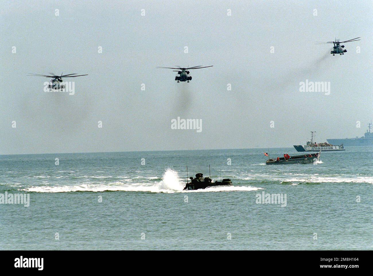CH-53E Super Stallion helicopters, left, and a CH-53 Sea Stallion ...