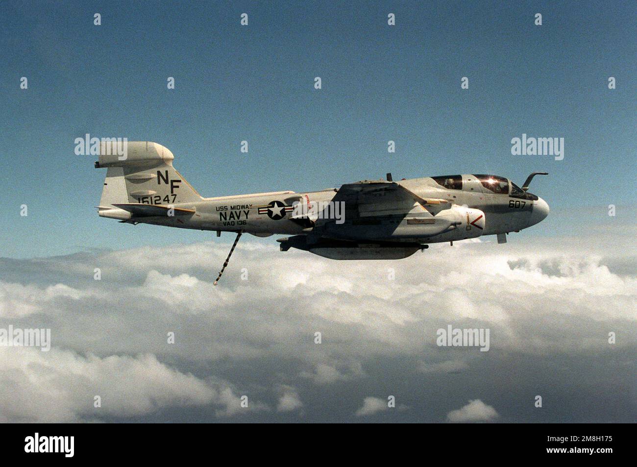 An air-to-air, right side view of a Tactical Electronic Warfare ...