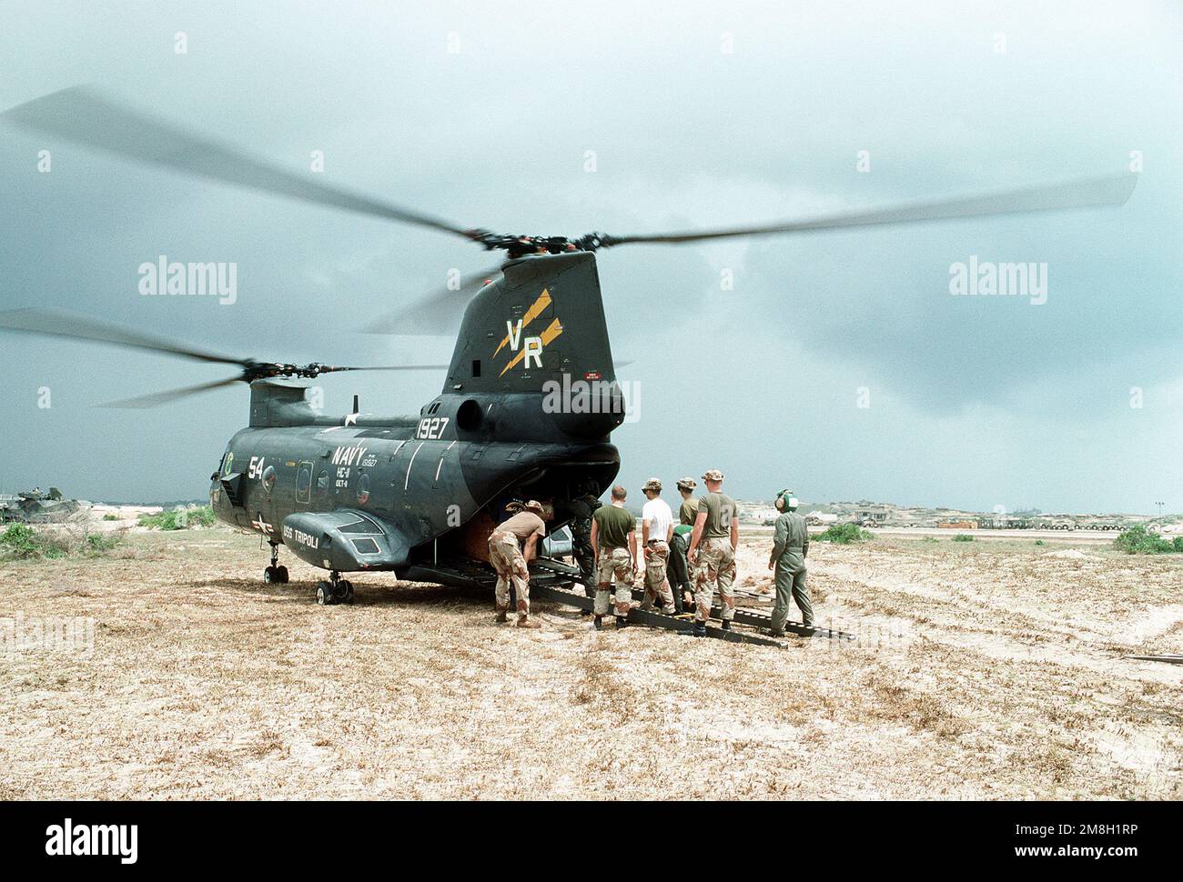 Members of the amphibious assault ship USS TRIPOLI (LPH-10) beach ...