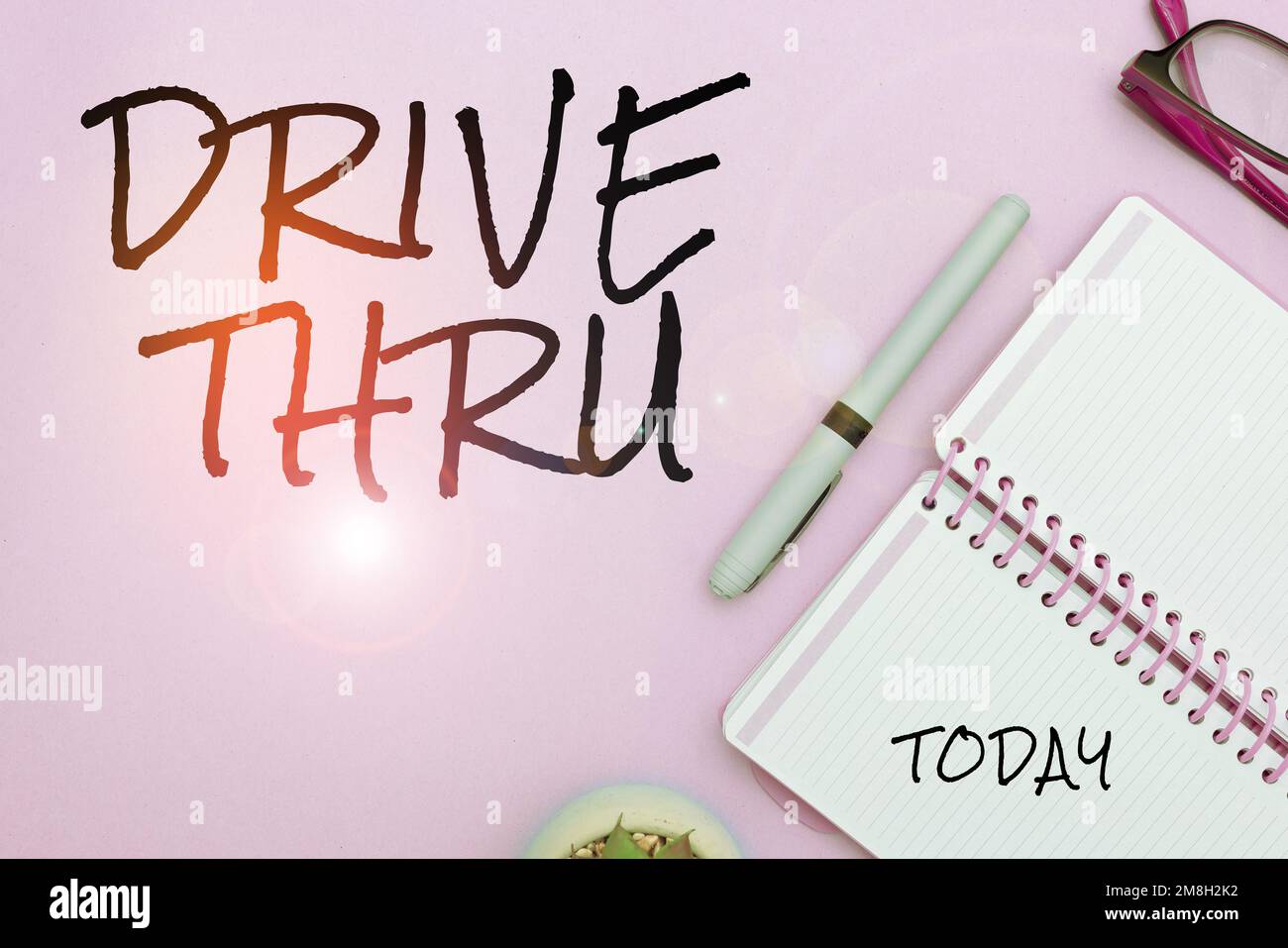 Hand writing sign Drive Thru. Business overview place where you can get ...