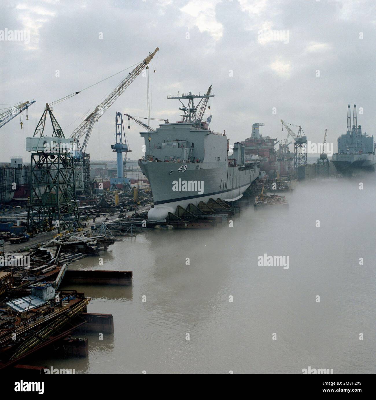 A port bow view of the dock landing ship HARPERS FERRY (LSD-49) on the ...