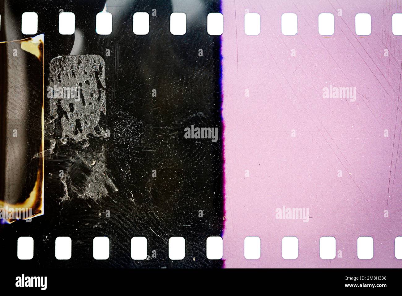 Dusty and grungy 35mm film texture or surface. Perforated scratched ...
