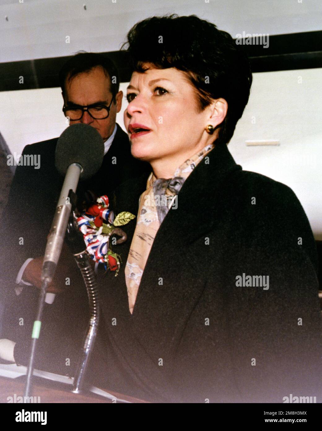 Mrs. John R. Dailey, ship's sponsor, speaks during the christening and ...