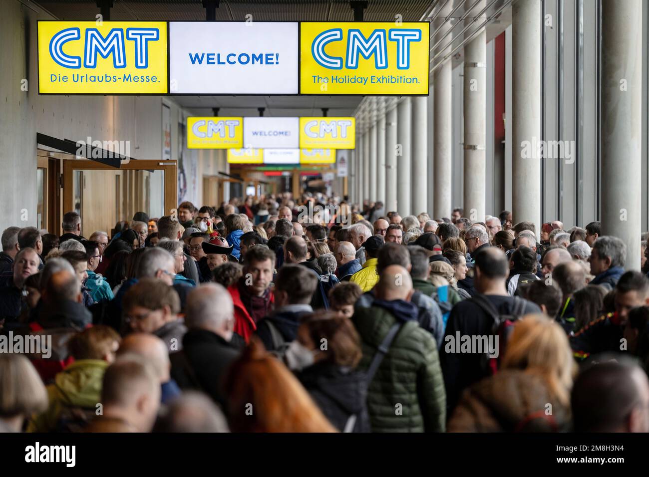 Stuttgart, Germany. 14th Jan, 2023. Visitors crowd an aisle at Messe ...