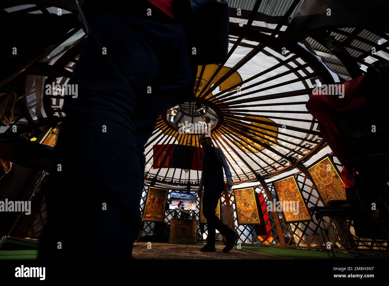 Stuttgart, Germany. 14th Jan, 2023. Visitors stand in a yurt at the ...