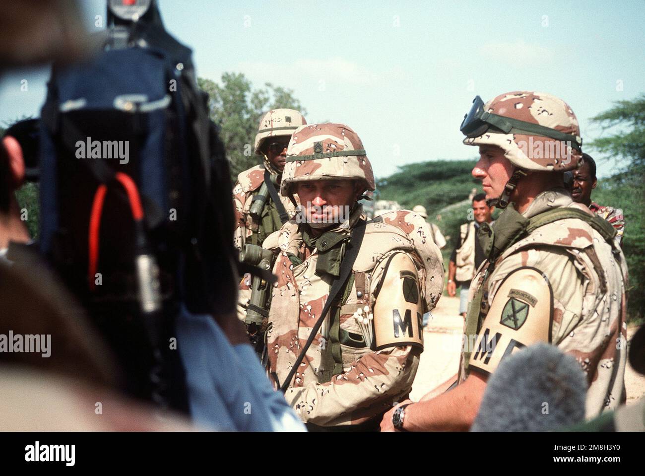 STAFF SGT. William Turconic of the 511th Military Police Company briefs ...