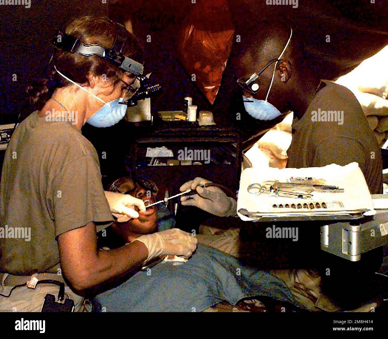 DD-SD-00-00822. [Complete] Scene Caption: US Navy LCDR Holly Nappon, a ...