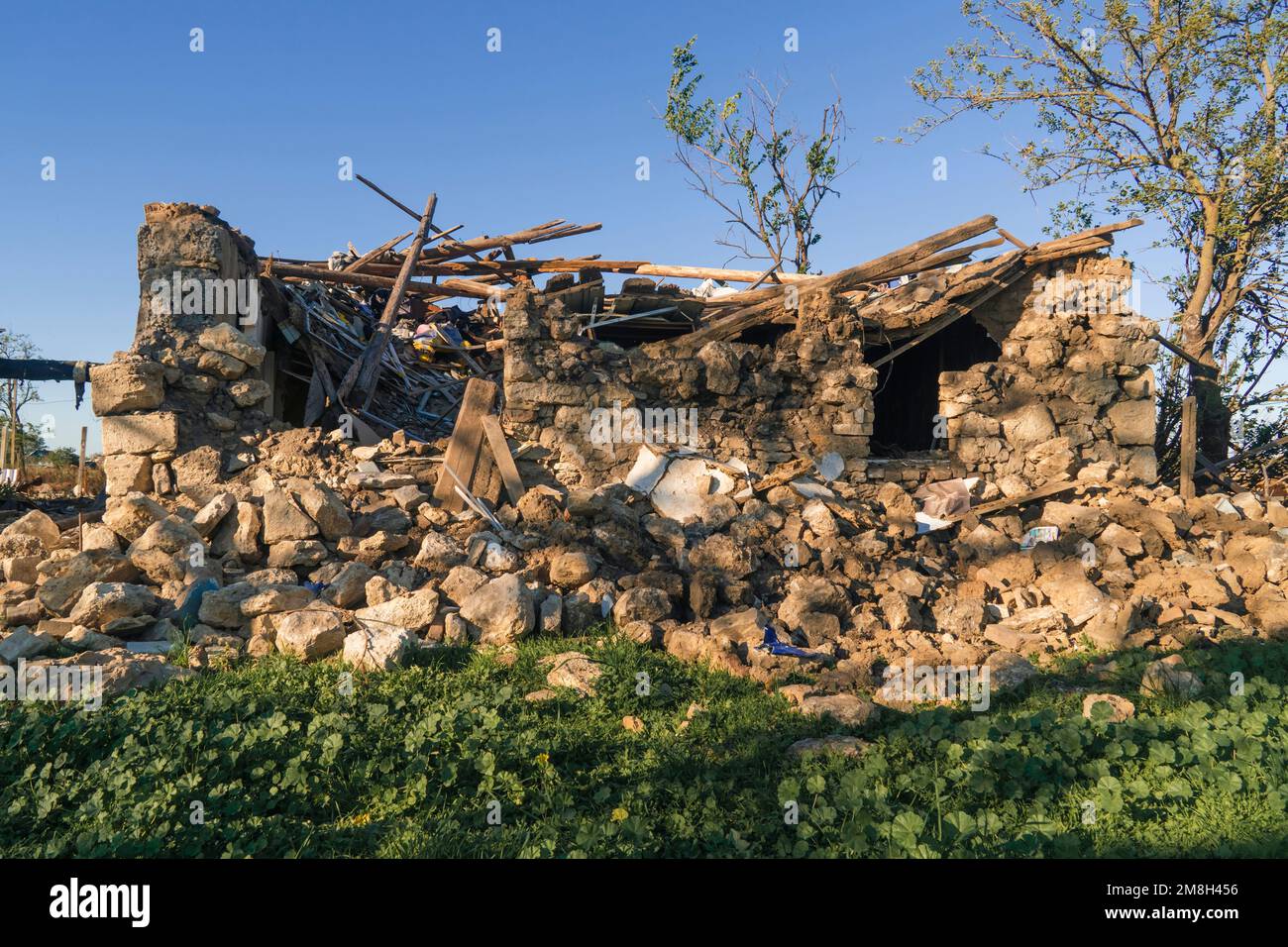 Countryside. Destroyed house after the battle. War in Ukraine. Russian ...