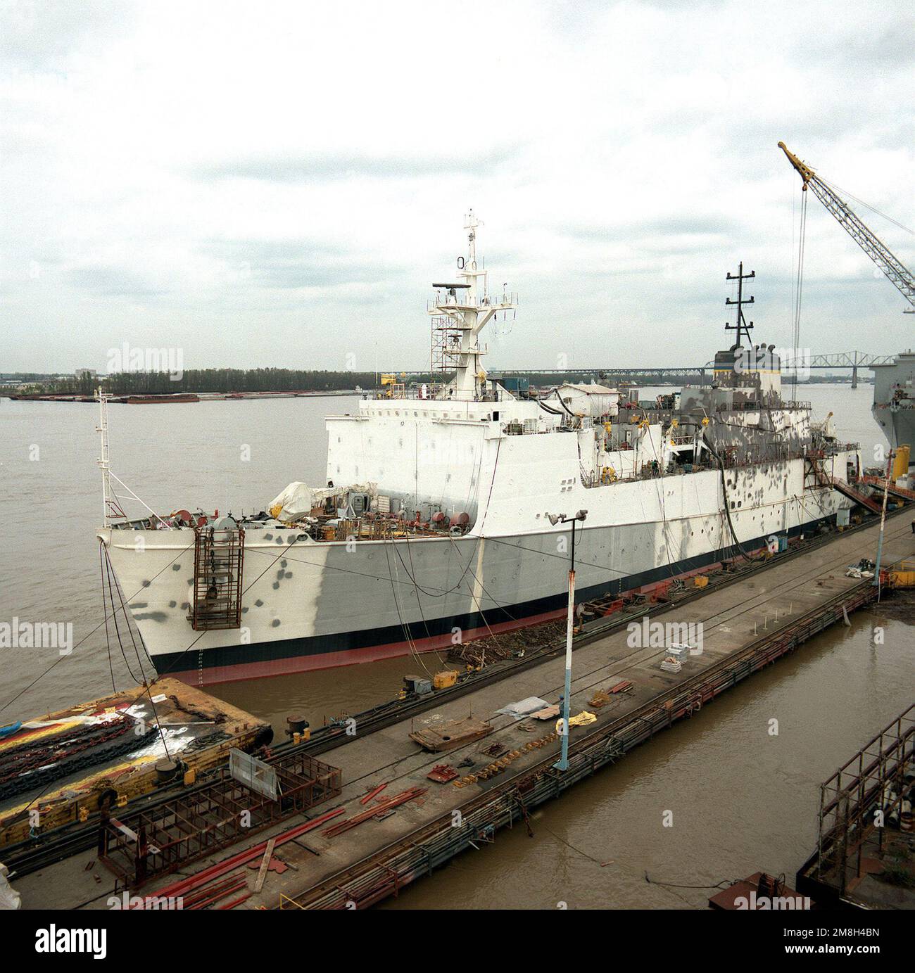 A port bow view of the surveying ship USNS WATERS (T-AGS-45) moored at ...