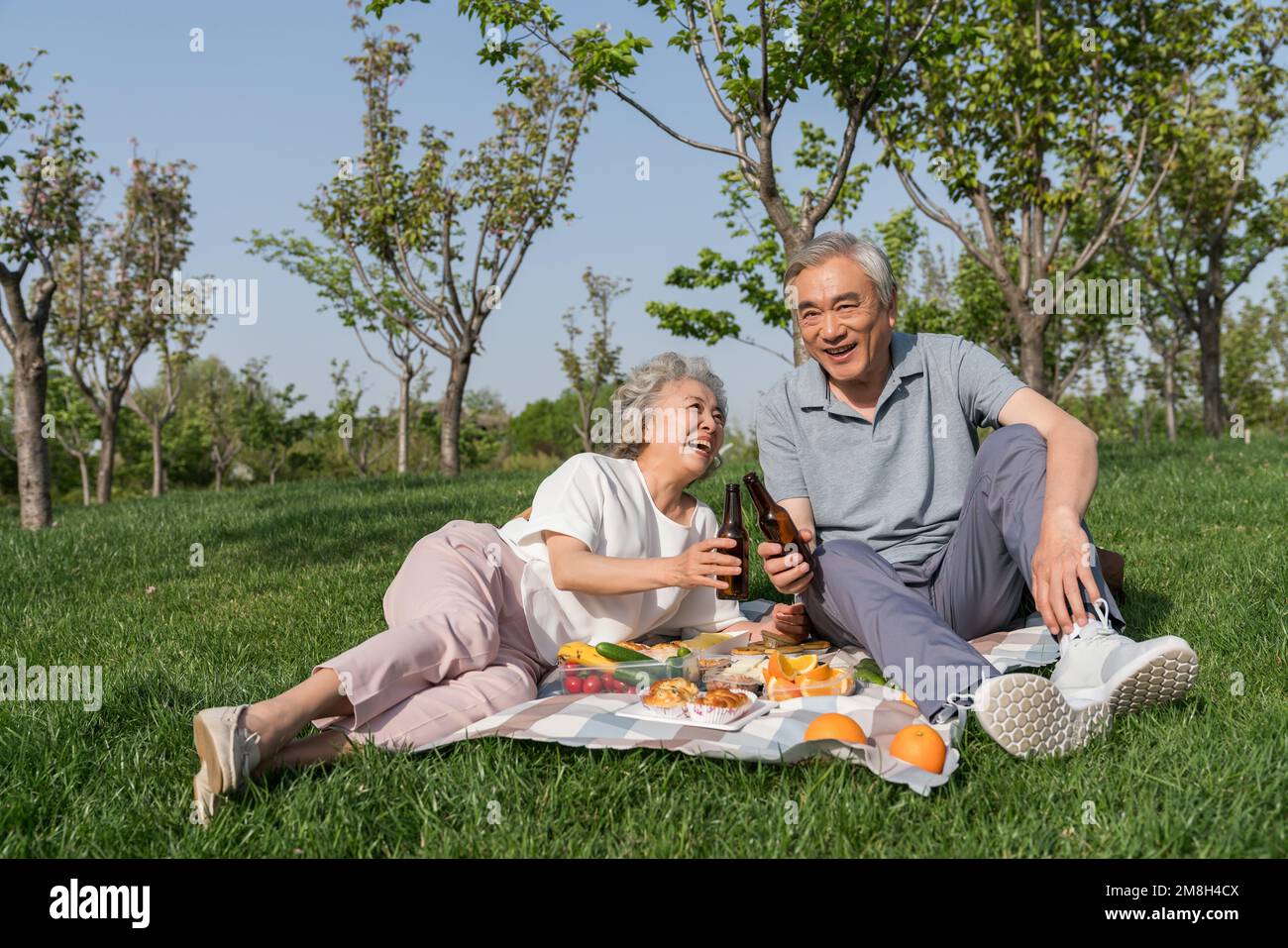 Smiling elderly couple share hi-res stock photography and images - Alamy