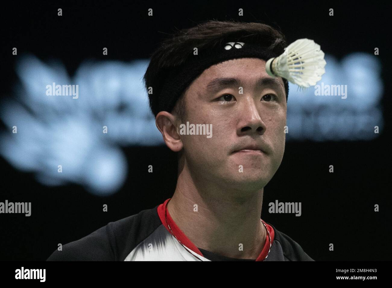 Hong Kong's Tang Chun Man react during their mixed double match at the ...