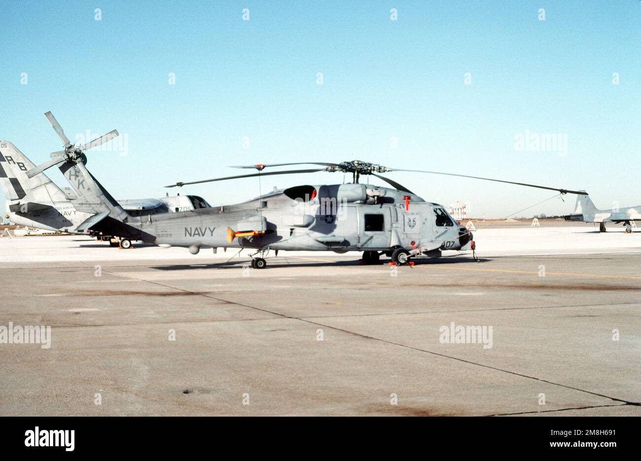 A right side view of a Helicopter Light Anti-submarine Squadron 40 (HSL ...