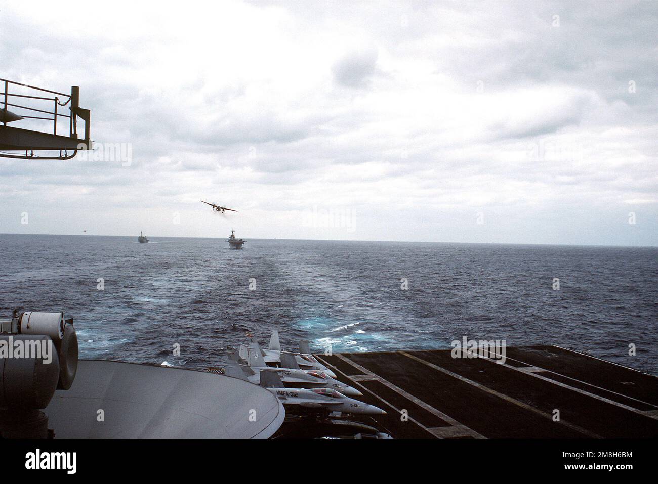A C-2A Greyhound aircraft approaches for a landing aboard the nuclear ...