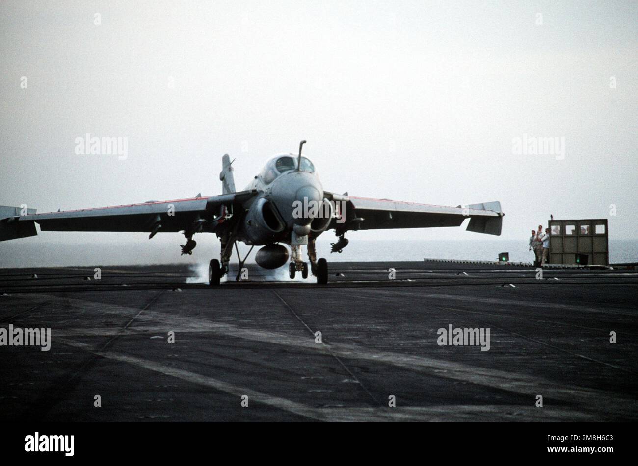 An Attack Squadron 145 (VA-145) A-6E Intruder aircraft lands on the ...