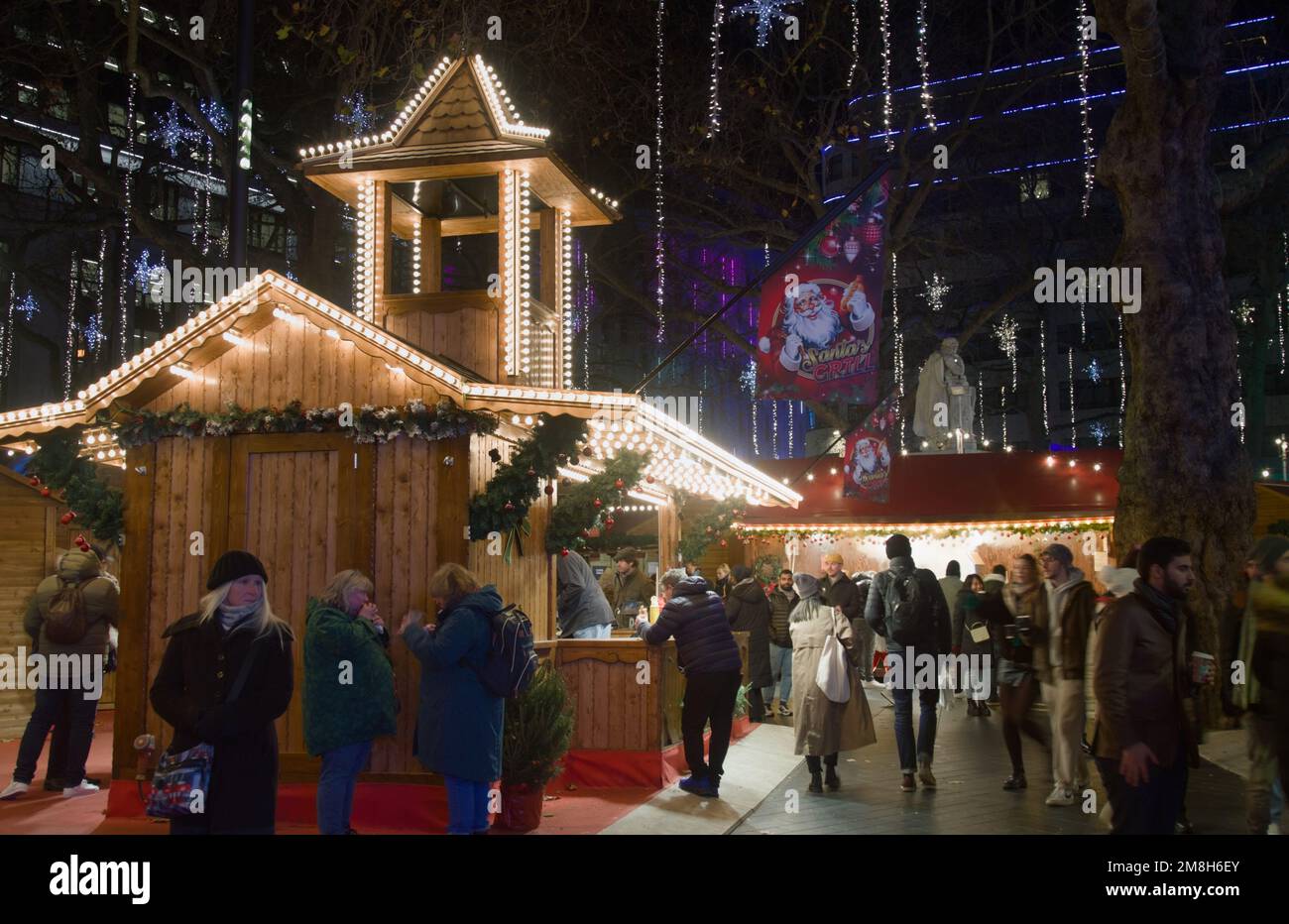 People Walking Round The Market Stalls In The Christmas Market At ...