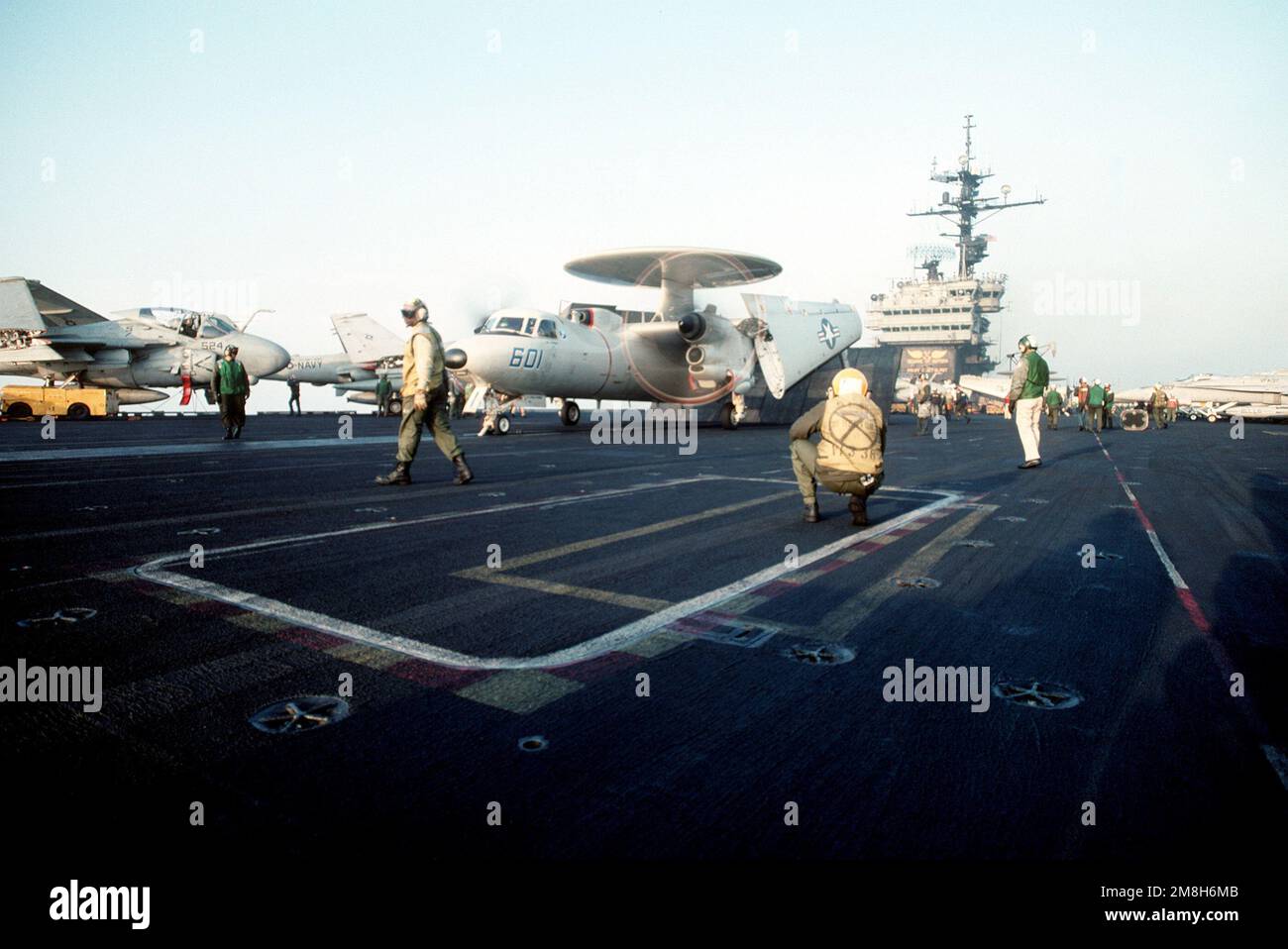 Catapult crew members prepare to launch an Airborne Early Warning ...
