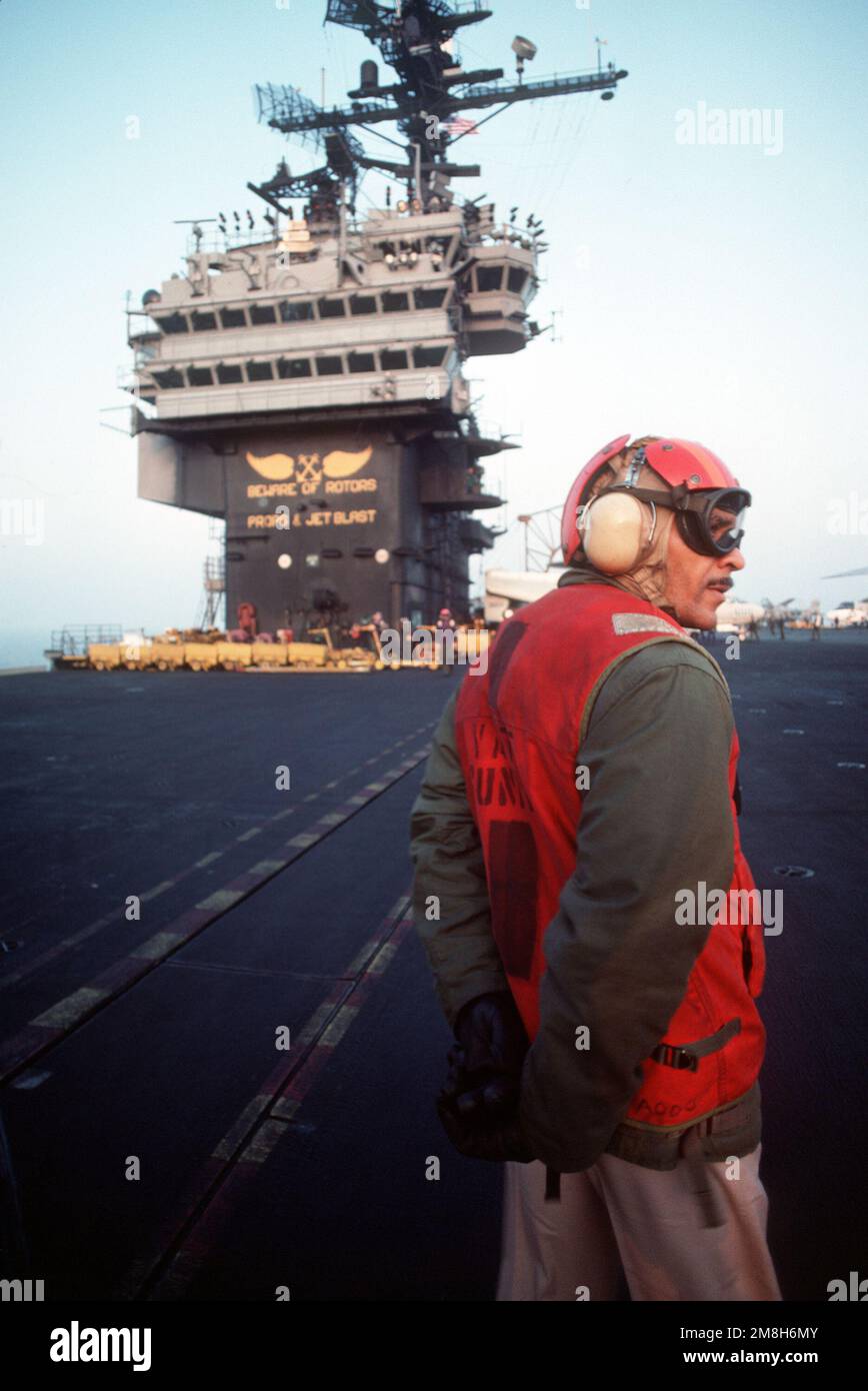 An aviation ordnance warrant officer from Attack Squadron 75 (VA-75 ...