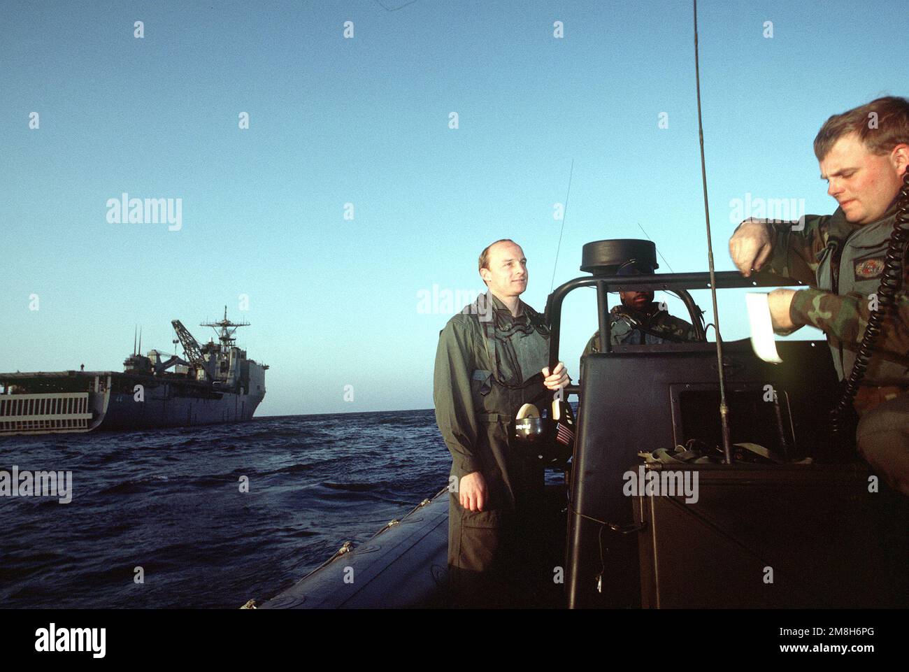 Members of Special Boat Unit 20 (SBU-20) riding in a rigid-hull ...