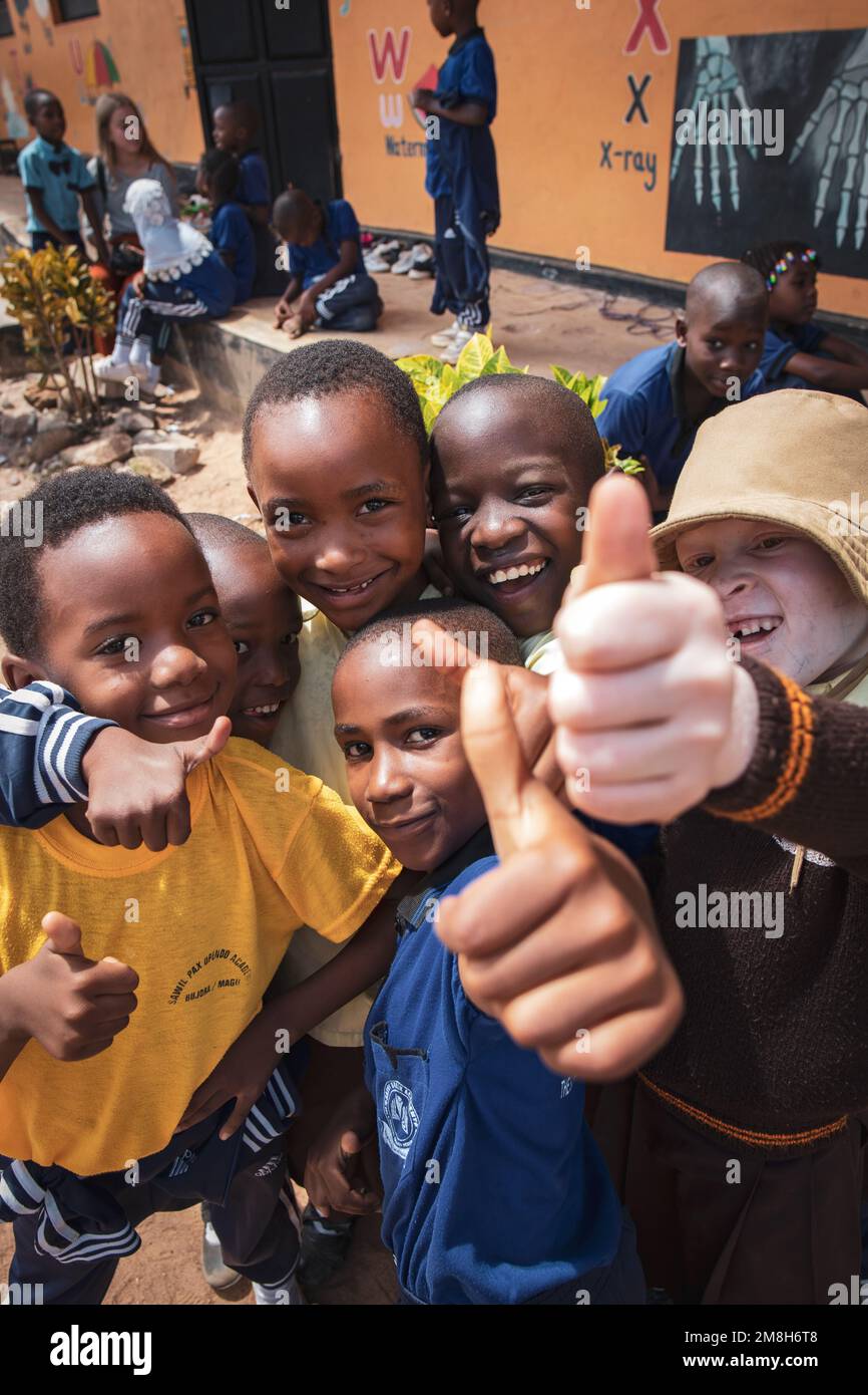 23rd of March 2022 - Mwanza, Tanzania - Children posing to camera for ...
