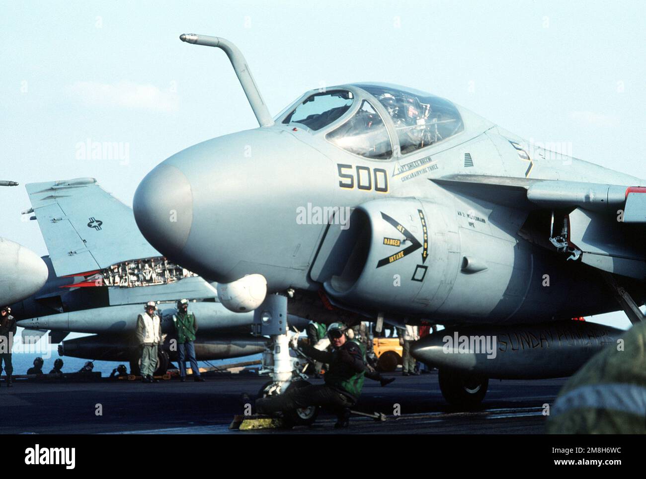 A Member Of The Holdbackhookup Crew Signals To The Catapult Officer As The Catapult Crew