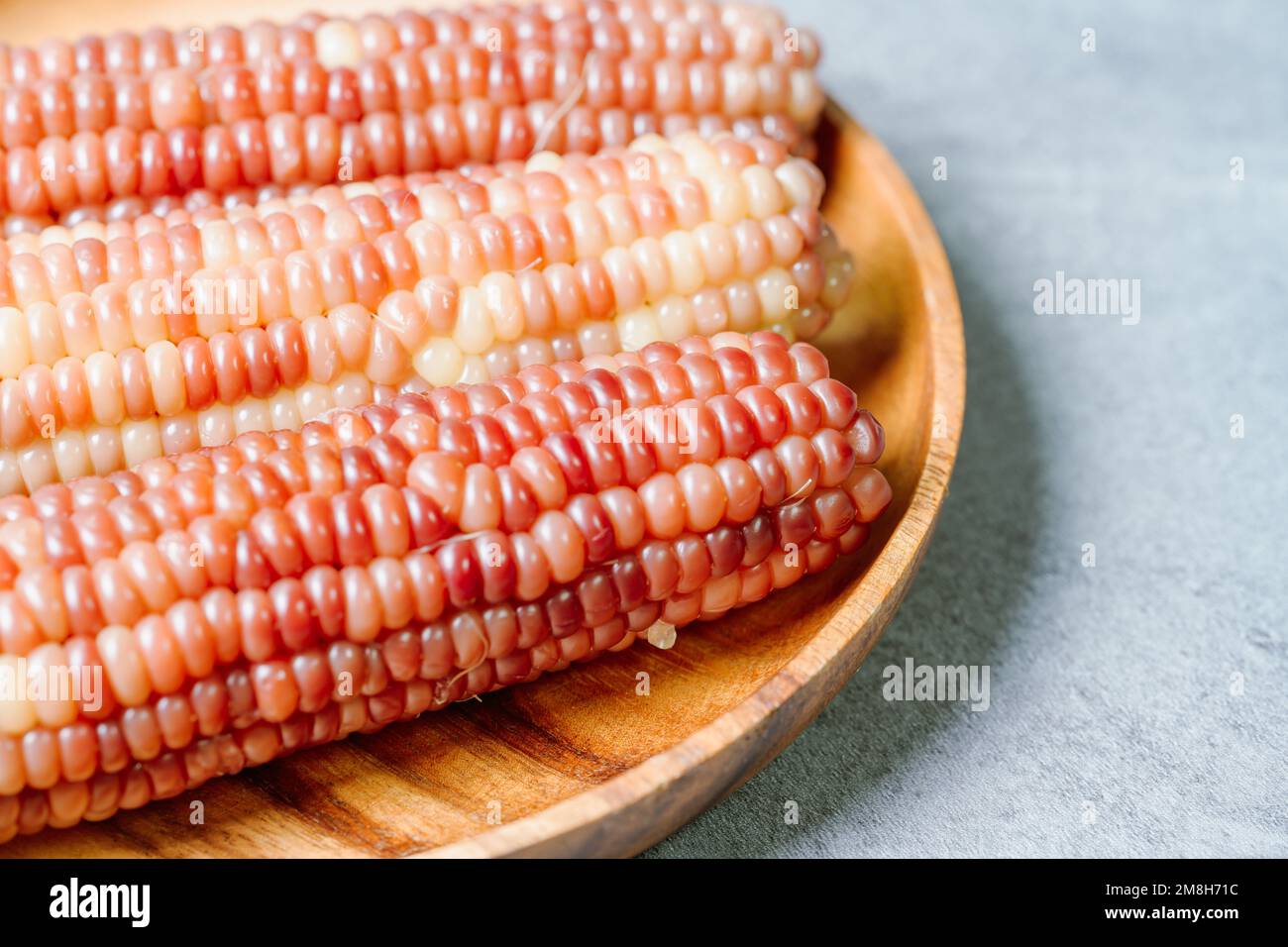 Delicious boiled waxy corn food served on the table Stock Photo - Alamy