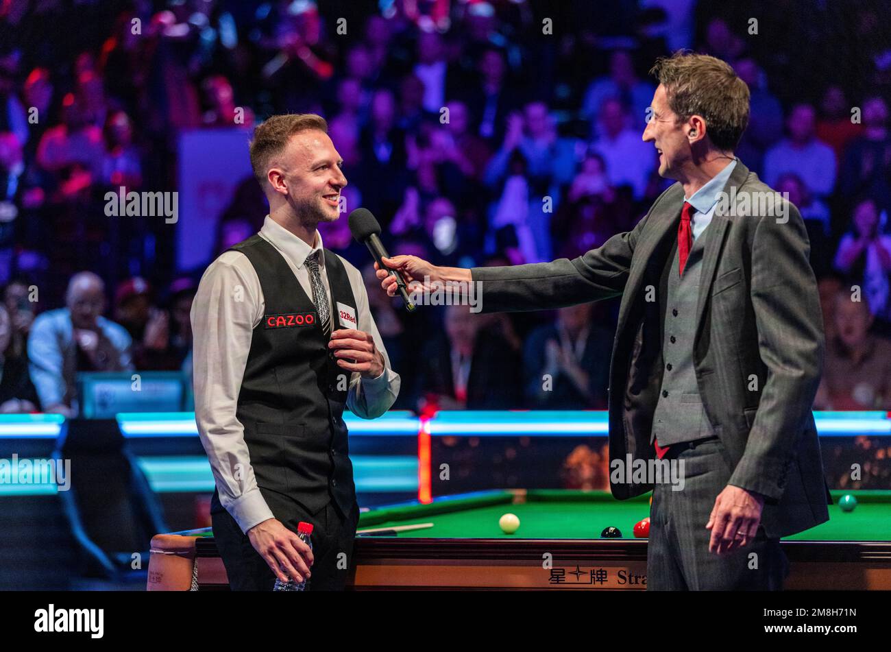 Judd Trump talking to Rob Walker after winning his match during day six ...