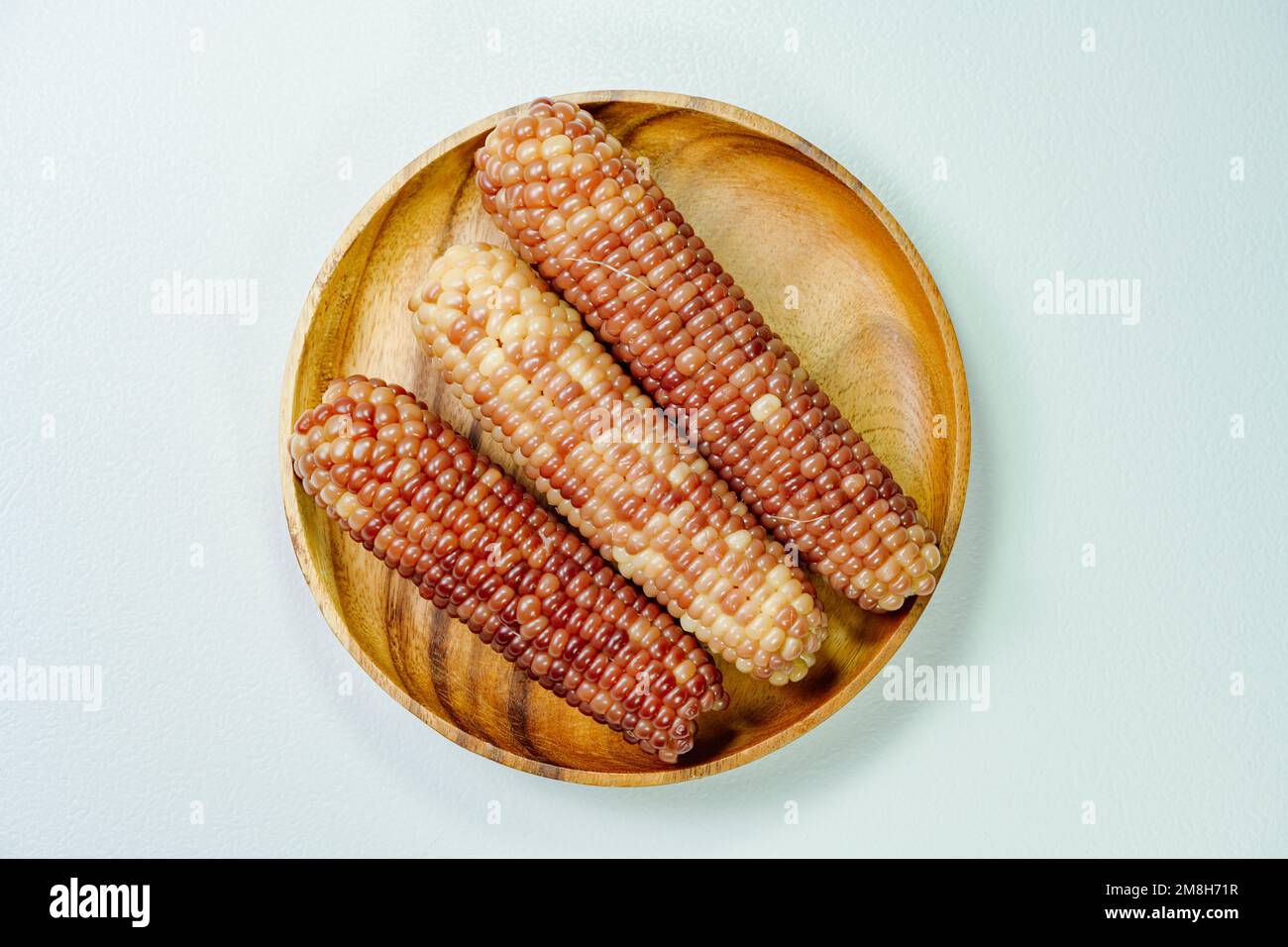 Delicious boiled waxy corn food served on the table Stock Photo - Alamy