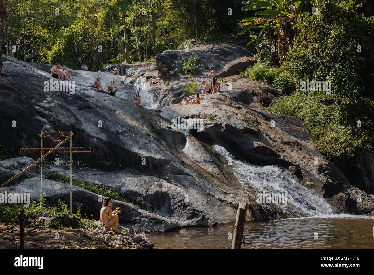 Pai, Thailand. November 25, 2022. Mo Paeng Waterfall with tourists ...
